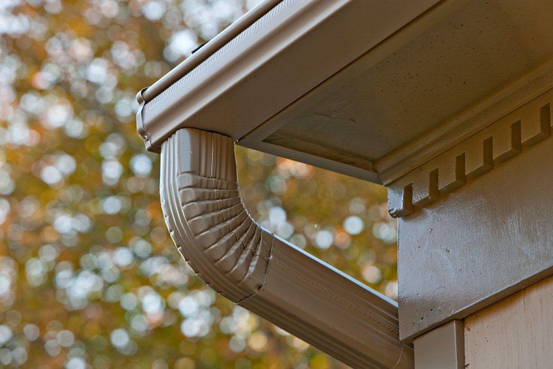 Can I Move a Gutter Downspout? - Rescue My Roof